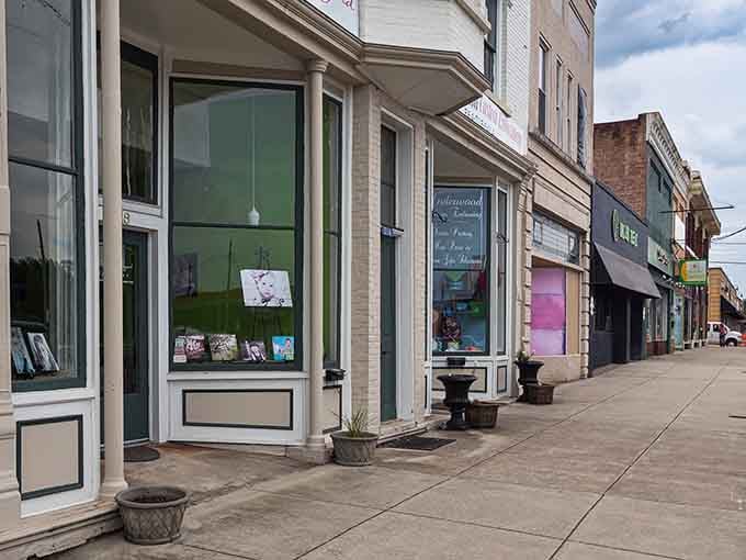 Local shops line the sidewalks, each one owned by actual humans you might chat with.