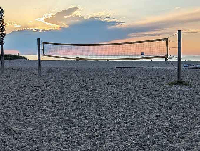 Beach volleyball at sunset because apparently Walnut Beach decided to go full California without asking permission from anyone.
