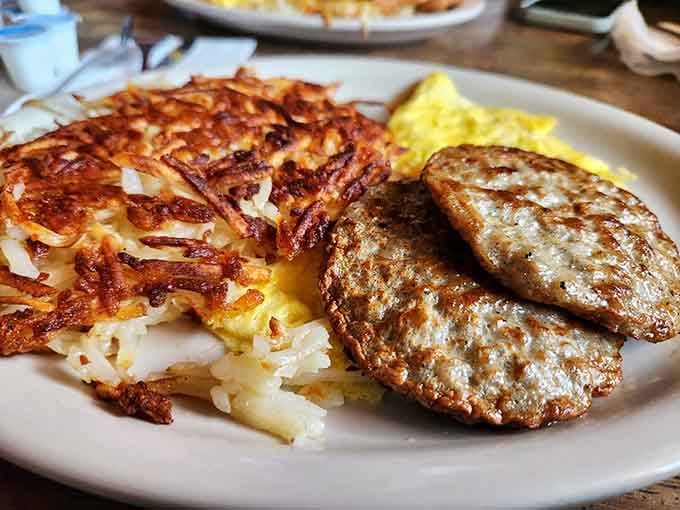Crispy hash browns and perfectly seasoned sausage patties form a breakfast dream team that never disappoints anyone.