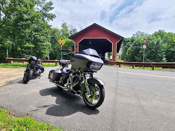 Even motorcyclists can't resist stopping for a photo op with Massachusetts' longest covered bridge as their backdrop.