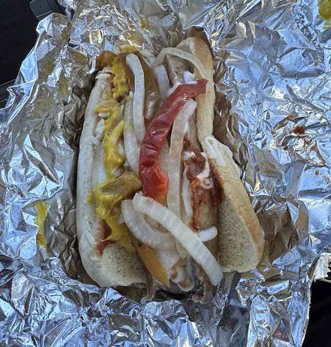 Italian sausage loaded with peppers and onions proves that street food can be absolutely transcendent when done properly.