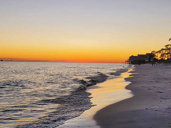 Golden hour transforms ordinary shoreline into something that belongs on a postcard you'd actually send.