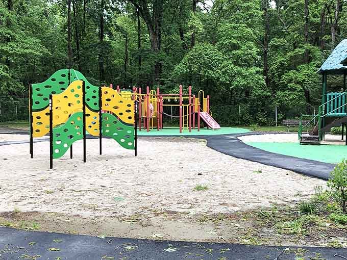 The playground keeps little ones entertained while parents contemplate the revolutionary concept of sitting down for five minutes.