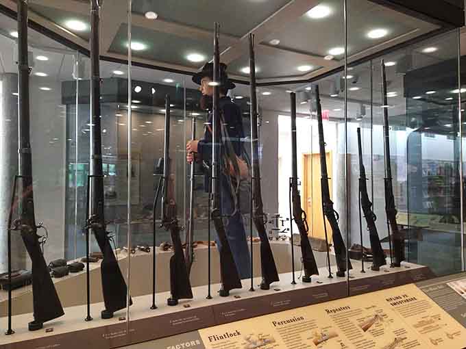 Rows of period firearms tell the story of Civil War technology better than any lecture ever could.
