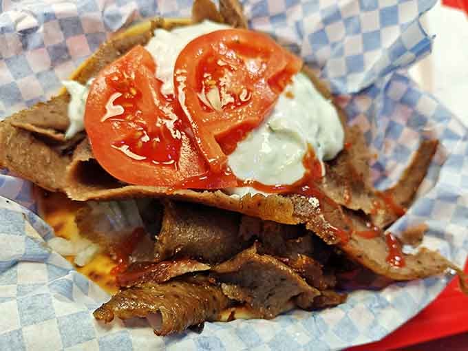 Look at those perfectly seasoned meat ribbons topped with fresh tomatoes and creamy tzatziki begging to be devoured immediately.