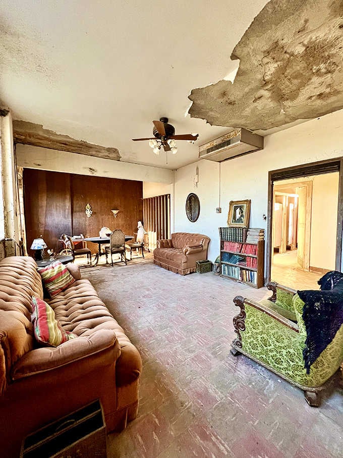 The nuns' parlor still holds furniture from another era, though current occupants may not require actual chairs anymore.