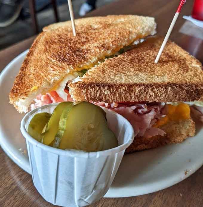 Golden-toasted perfection holds together ham and cheese in this classic sandwich done absolutely right.