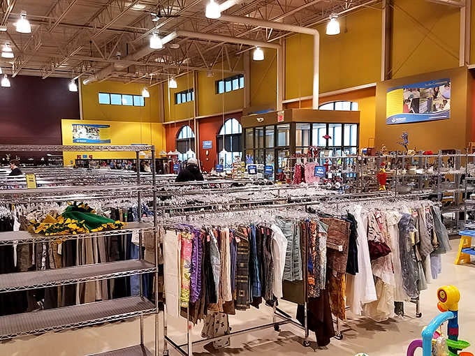 Soaring yellow and orange walls frame rack after rack of clothing inside this cheerful, cathedral-ceilinged Appleton shop.