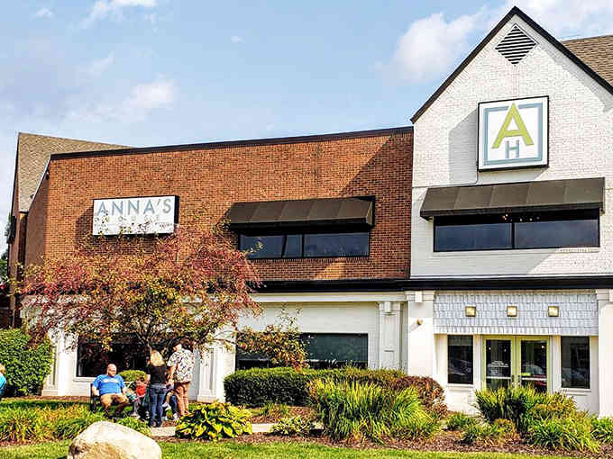 The mix of brick and modern architecture creates an inviting facade that draws breakfast lovers like moths to light.