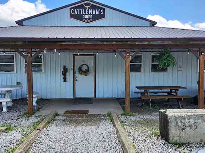 Rustic metal siding and picnic tables under the porch create an unpretentious setting for serious comfort food.
