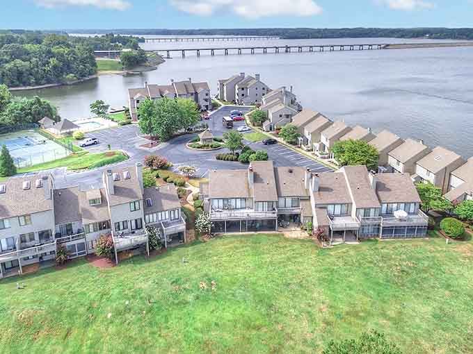 Where water meets land, this lakeside community stretches peacefully along shores that shimmer like liquid silver.