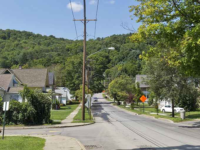 Quiet residential blocks slope gently toward green hills, creating postcard views that change beautifully with every passing season throughout.
