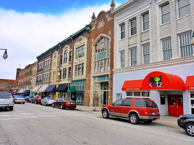 Decatur's colorful row of storefronts lines up like a welcoming committee, with that bright red Katz awning stealing the show.
