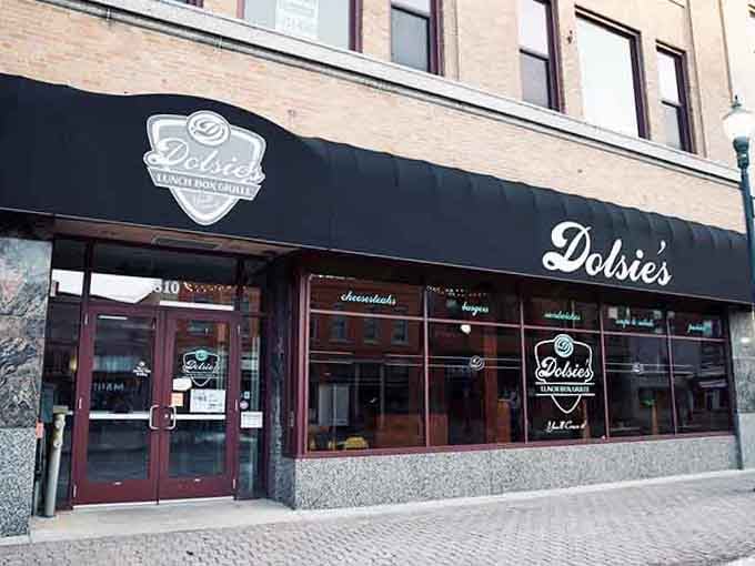 That sleek black awning and polished storefront bring downtown sophistication to the humble art of lunch done right perfectly.