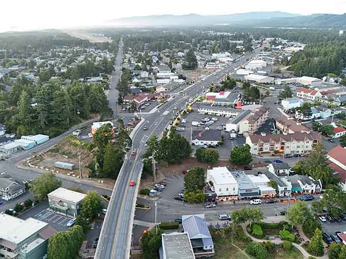 The main highway cuts through town where mountains rise up like nature's own welcome committee.