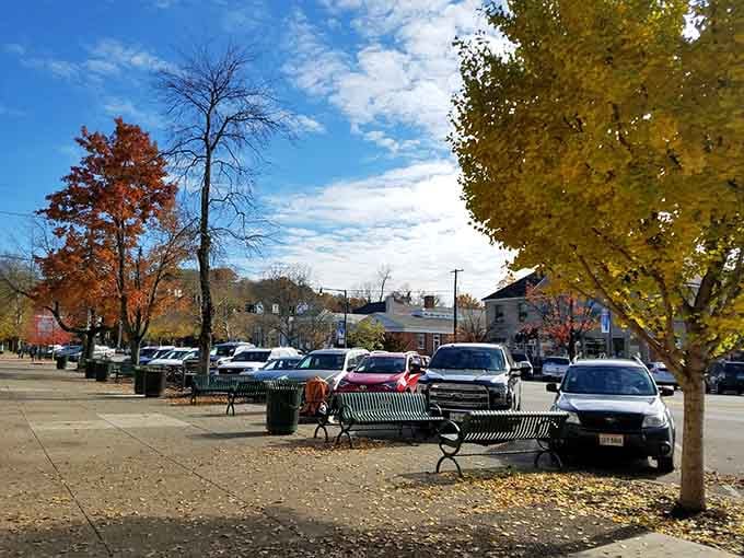 Autumn leaves frame the town square where parking is easy and every shop owner knows your name.