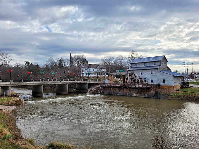 That historic mill by the water looks like it stepped straight out of a Currier and Ives print.