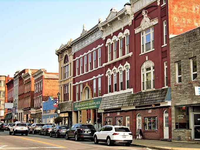 Ornate cornices and arched windows showcase architectural pride from an era when buildings were designed to inspire rather than just function.