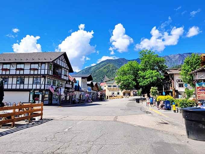 Bavarian buildings nestle against mountain peaks in a scene so picturesque it almost seems too good to be real.