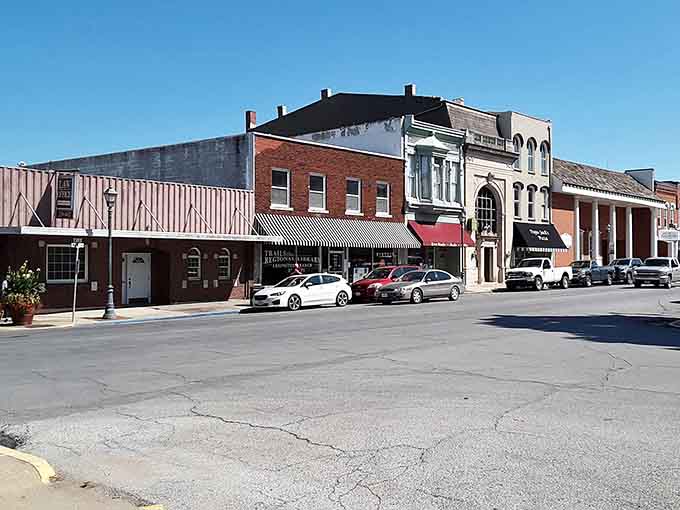 These cars park outside of historic buildings, proving classic style never goes out of fashion in any era.