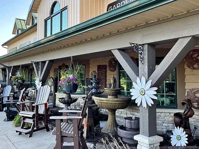 Cheerful daisy decorations and fountains welcome visitors to this whimsical garden center bursting with creative displays.