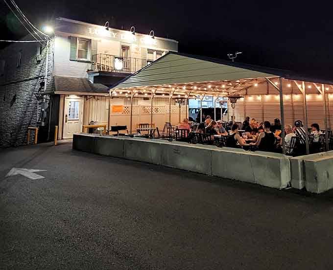 Those twinkling lights transform this outdoor patio into the kind of magical evening spot where hot dogs taste even better.