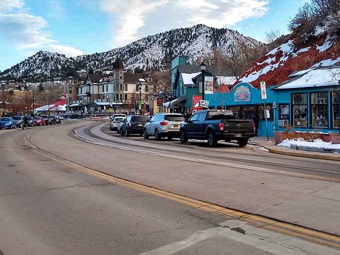 Snow-dusted peaks tower over this quirky mountain town where colorful shops line streets built for wandering slowly.