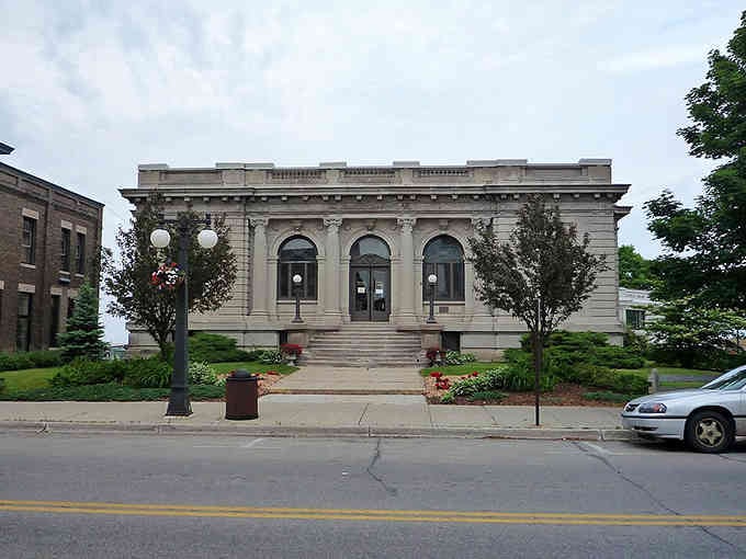 Classical columns and arched windows give this civic building the gravitas of a place where important things happen.