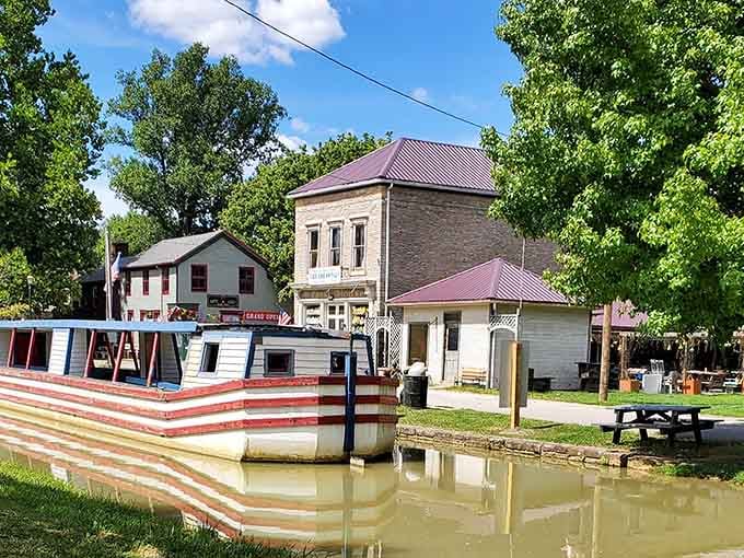 A patriotic canal boat floats peacefully, reminding us how Americans once traveled before highways existed.