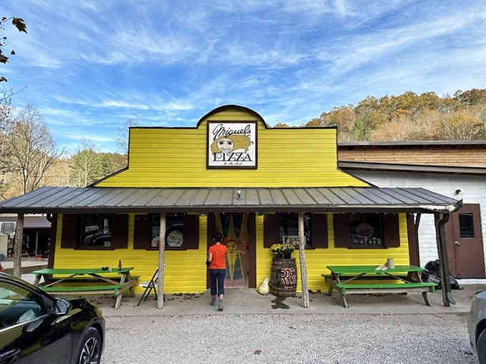 That sunshine-yellow exterior practically glows with the promise of hot pizza after a long day outdoors.