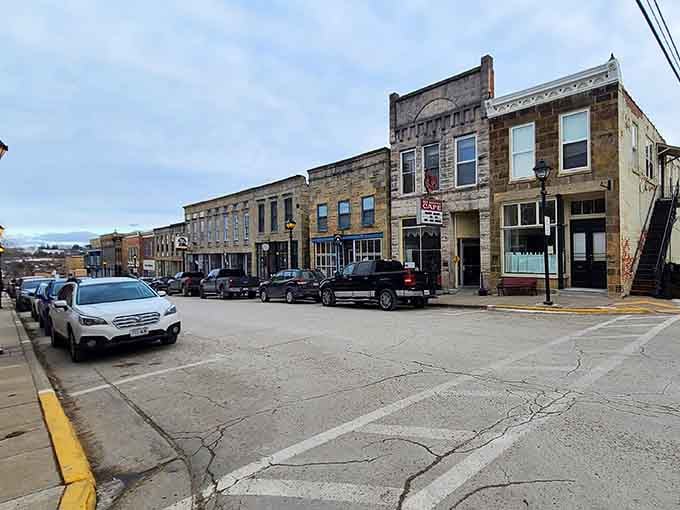 Sturdy limestone buildings stand shoulder to shoulder like old friends who've weathered every storm together since the mining days.