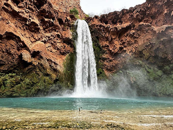 That turquoise pool beneath the thundering waterfall looks photoshopped, but Mother Nature doesn't need digital help here at all.