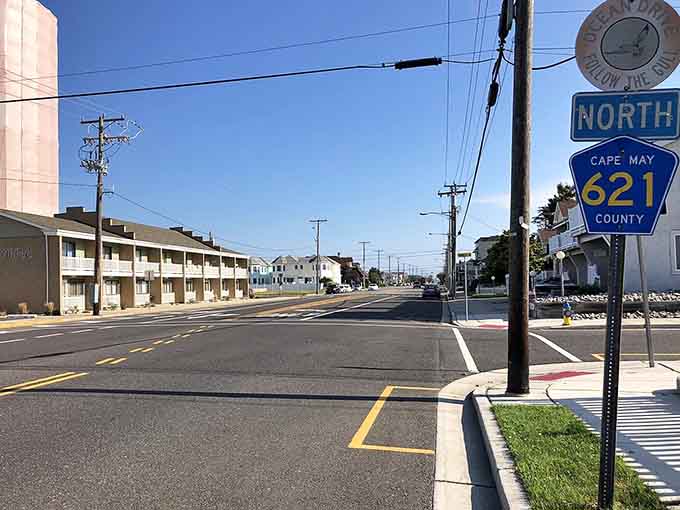 Ocean Drive's blue county marker signals the start of a coastal adventure where beach towns await around every bend.