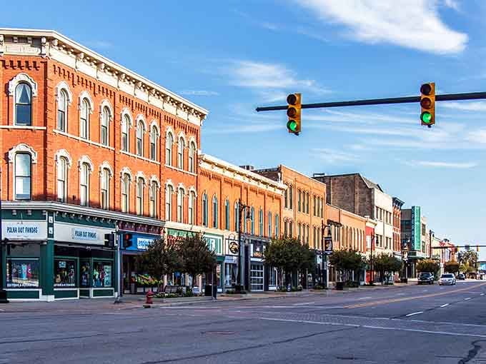 Port Huron's brick downtown glows golden in the sunlight, stretching toward the water like a postcard from affordable paradise.