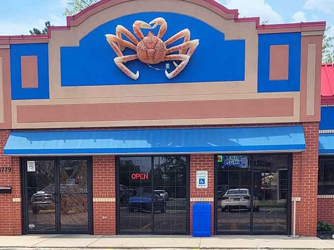 That oversized crab sculpture perched above the entrance isn't subtle, but neither are the bold flavors inside.