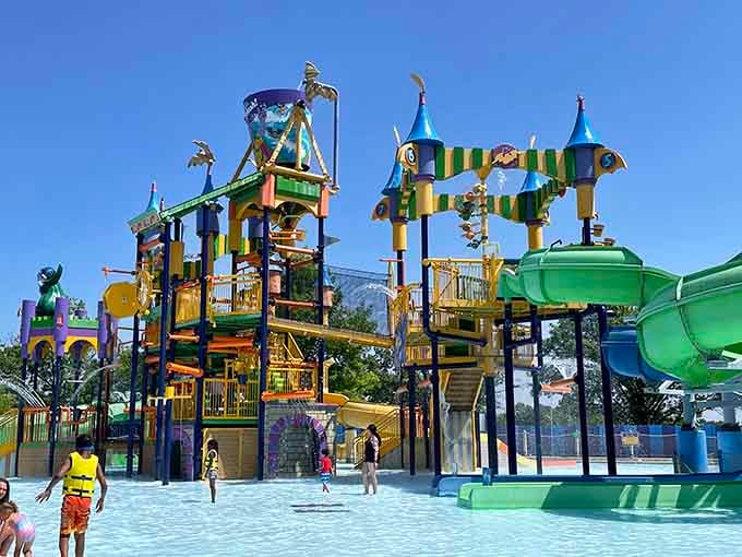 The Count's castle rises with whimsical turrets, inviting little ones to explore its watery medieval secrets.