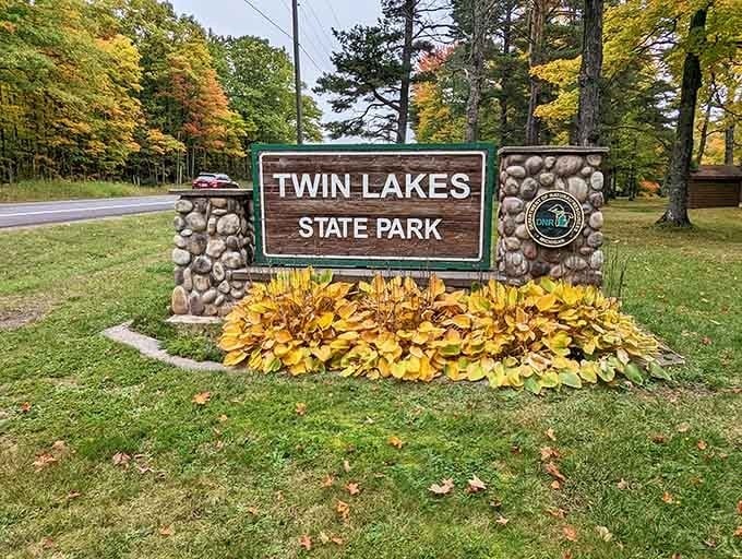 When fall colors meet classic park signage, you know you've found a place that understands the art of first impressions.