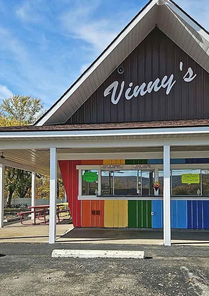 That rainbow-colored serving window brings pure joy before you even taste the ice cream and burgers inside.