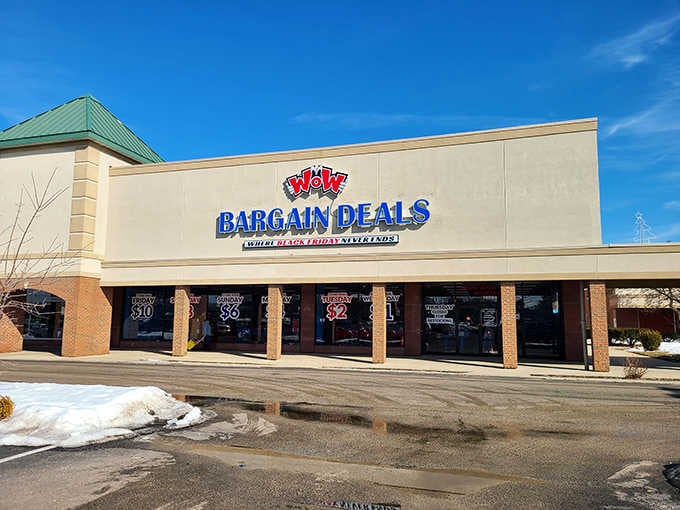 The green-topped turret and winter snow frame a storefront that promises warmth for your wallet year-round.