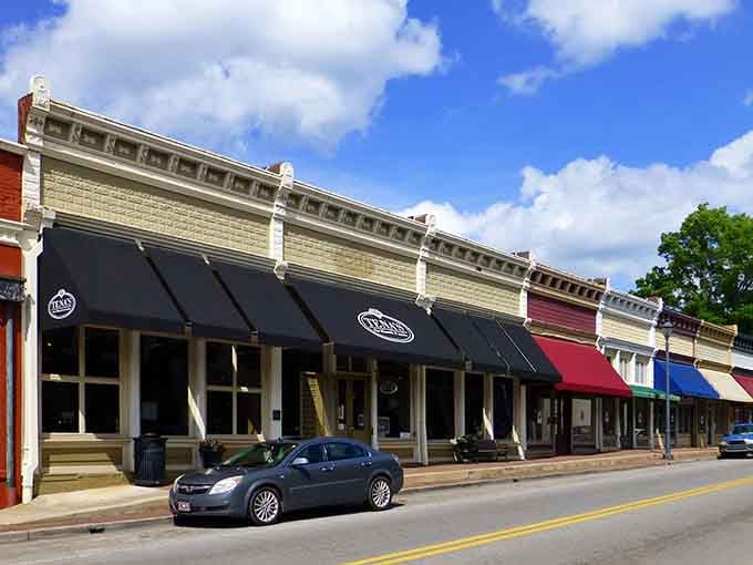 Colorful awnings line Main Street like a rainbow of small businesses, each one telling its own story.