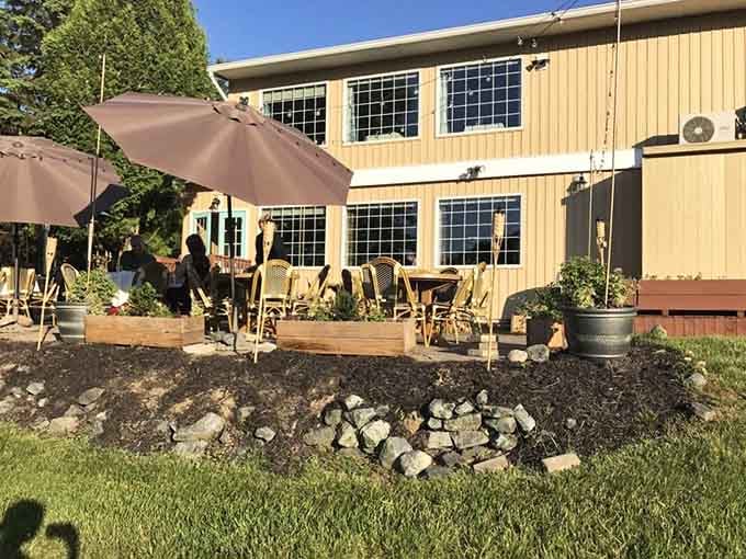 Those umbrellas promise lazy afternoons filled with great food, cold drinks, and even better company awaiting inside.
