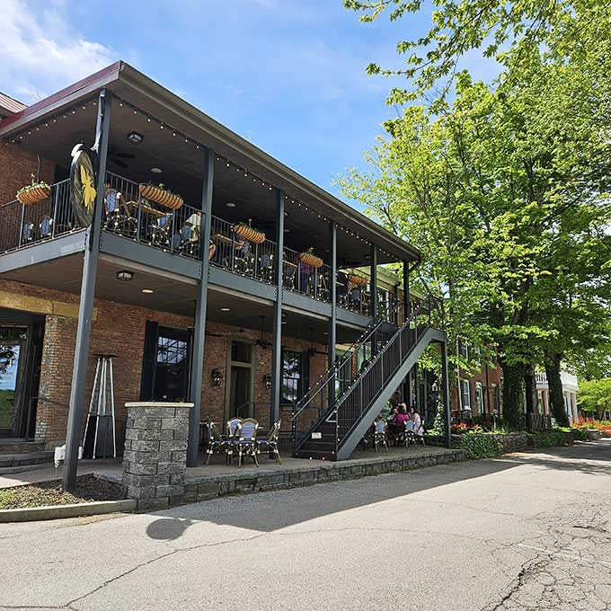 Two-story porches and twinkling lights promise Southern hospitality and leisurely evenings in this welcoming riverside retreat.