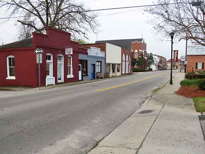 Small-town storefronts painted in cheerful colors that prove retirement doesn't have to mean beige everything, thank goodness.