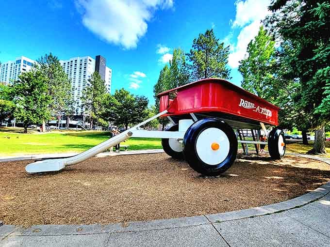 Under brilliant blue skies, this giant wagon celebrates childhood memories with a slide attached for good measure.