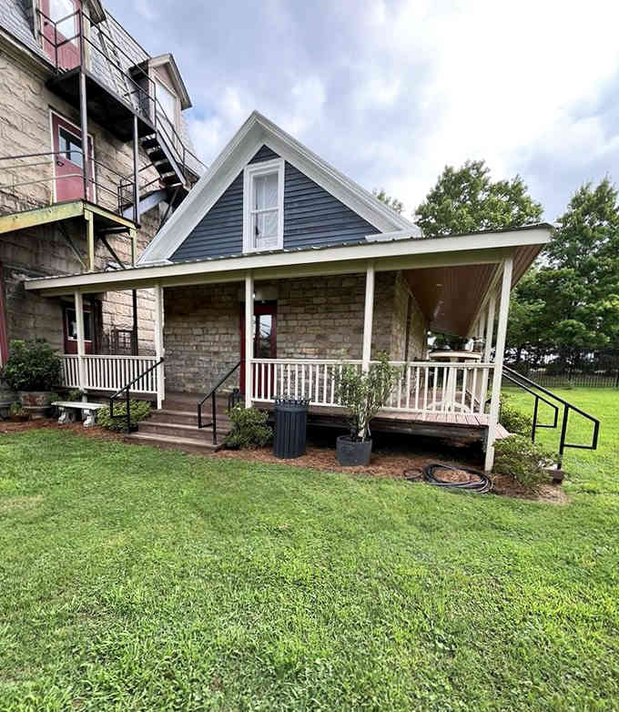 That welcoming front porch adds Southern hospitality to castle grandeur in the most unexpected and charming way.