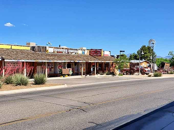 Rustic storefronts and old farm equipment create a living museum where you can actually grab lunch and browse.