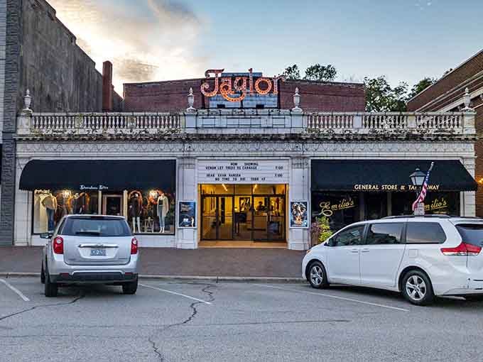 The vintage theater's neon glow promises entertainment just like when your parents had their first date here.