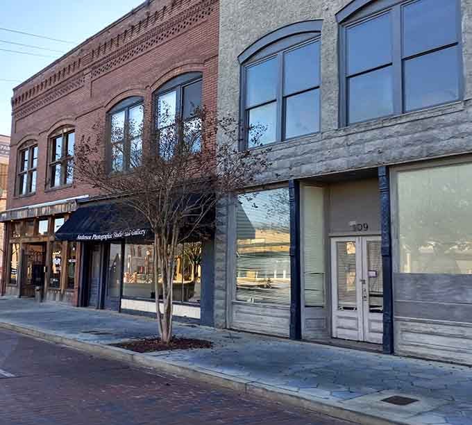 These storefronts blend red brick history with modern updates, creating a streetscape that honors yesterday while embracing today.