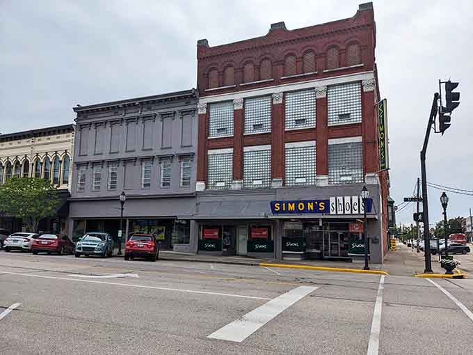 Historic storefronts wear their age with dignity, their varied facades creating a patchwork of architectural history worth preserving.
