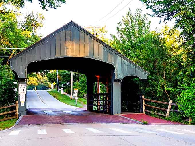 Evening light filters through the trees as this unique covered bridge welcomes visitors into charming Long Grove.